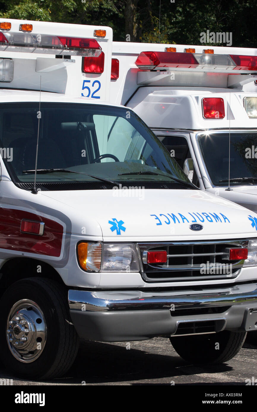 Two ambulances sitting ready for a 911 call Stock Photo - Alamy