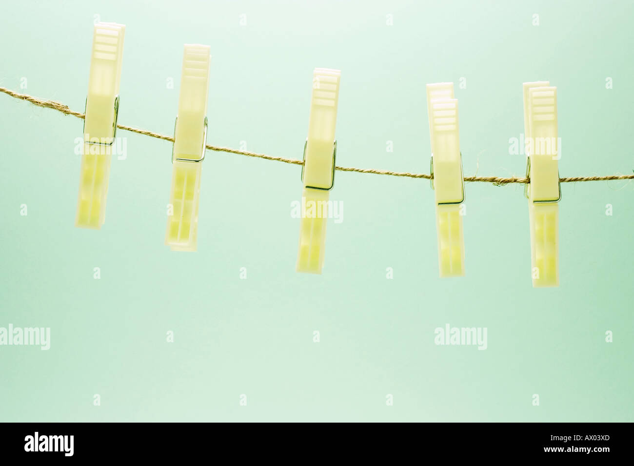Clothes Pegs on String Stock Photo - Alamy