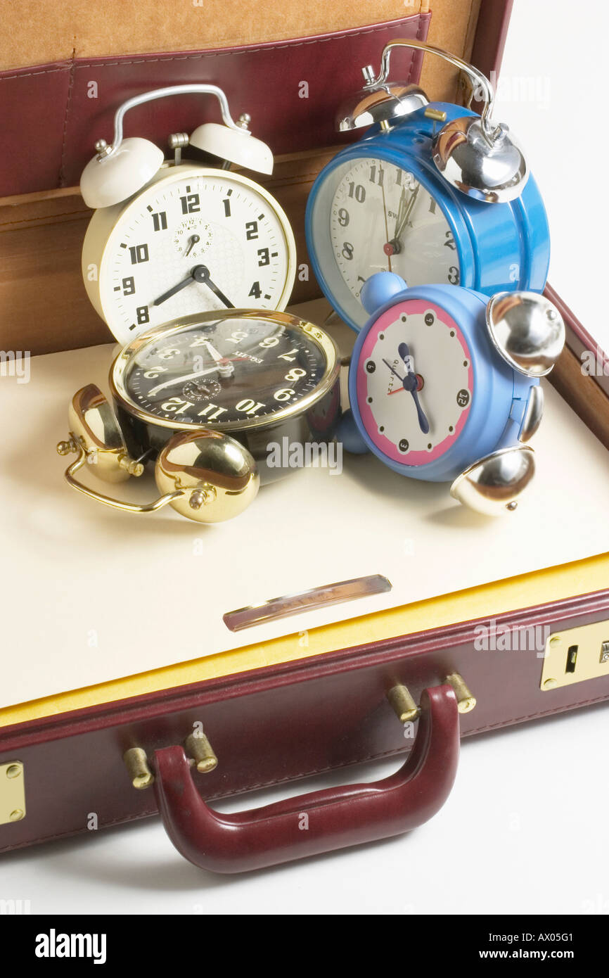 Alarm Clocks in Briefcase Stock Photo - Alamy