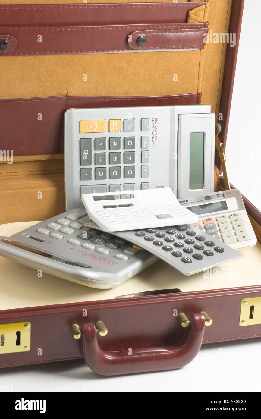 Calculators in Briefcase Stock Photo - Alamy