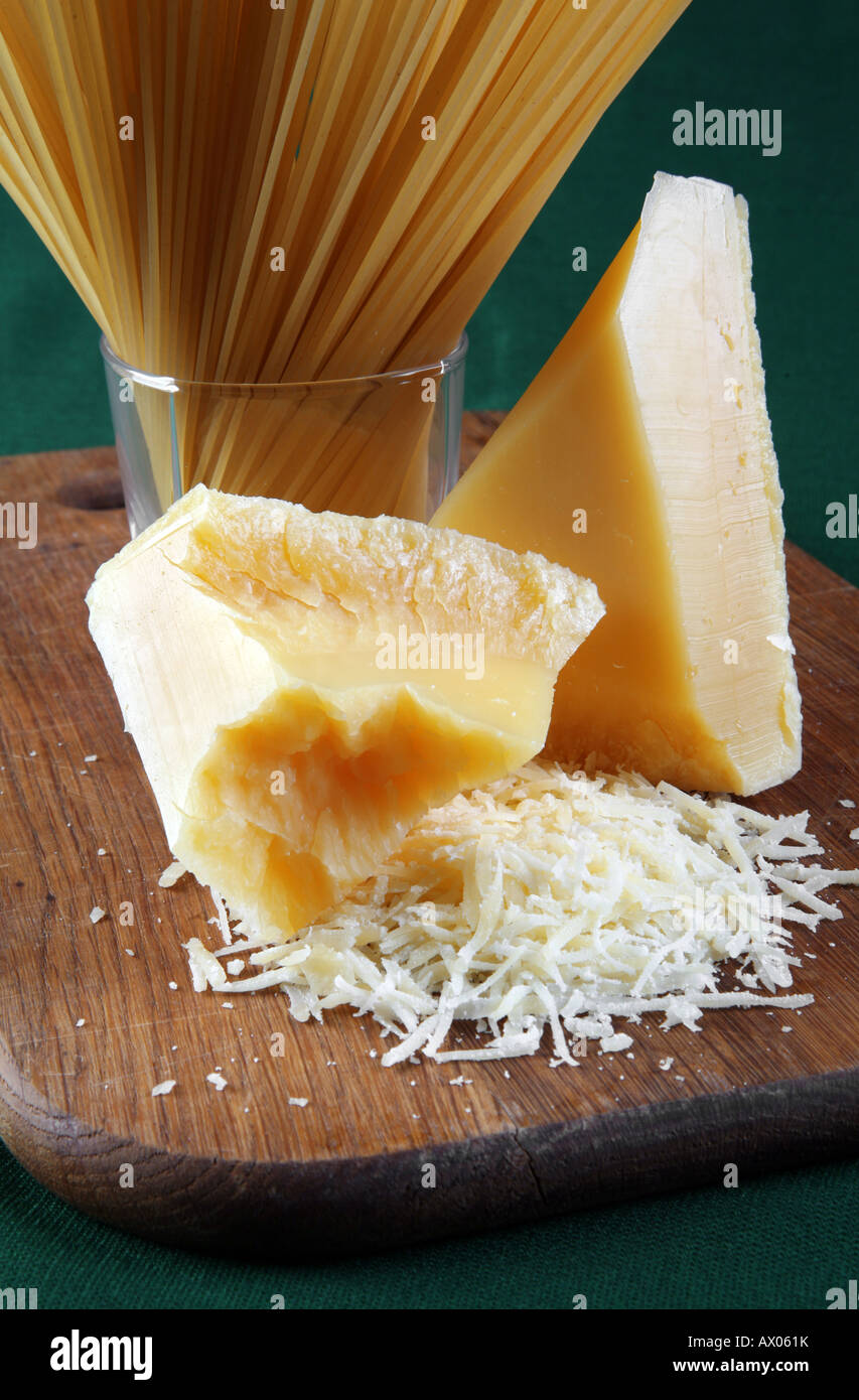 Dairy product parmesan cheese broken closeup view Stock Photo - Alamy