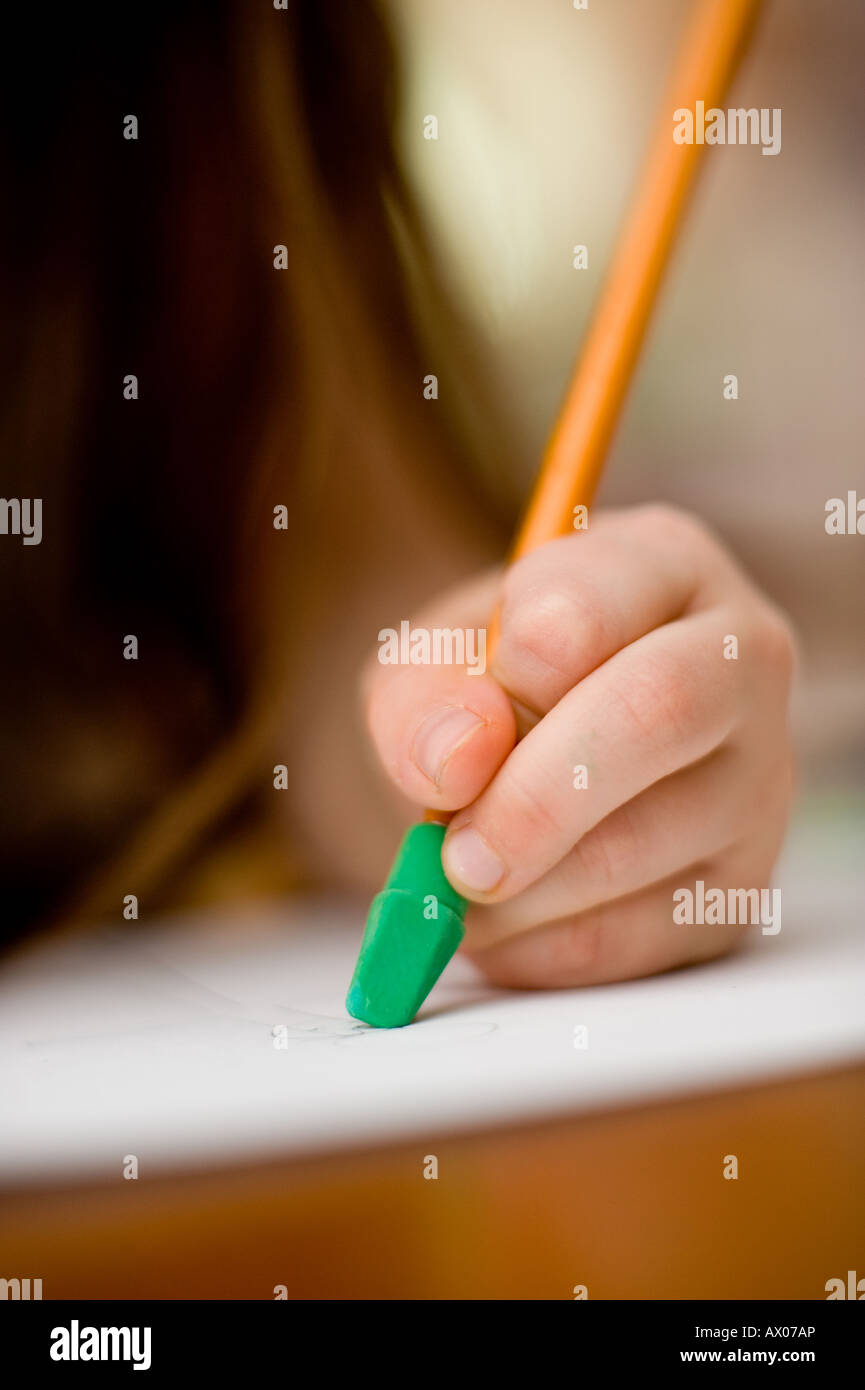 A child hand holding a pencil Stock Photo - Alamy