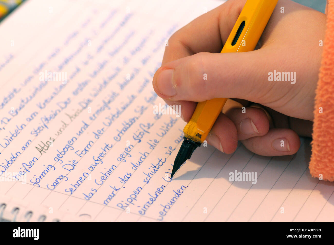 Girl doing homework Stock Photo - Alamy