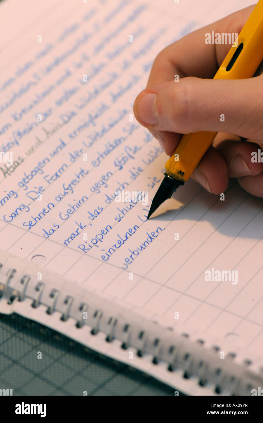Girl doing homework Stock Photo - Alamy