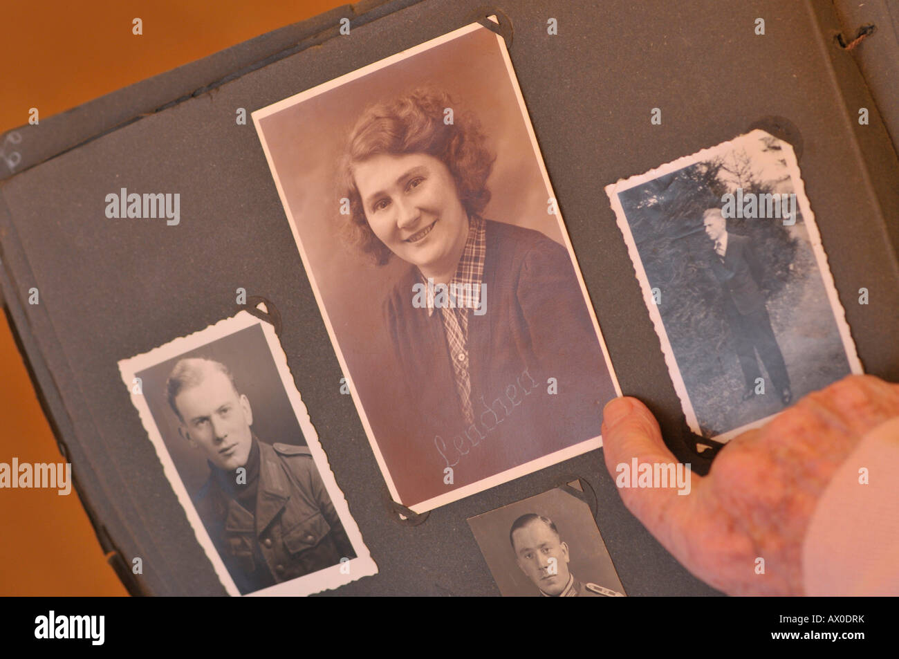 Looking through photo album hi-res stock photography and images - Alamy