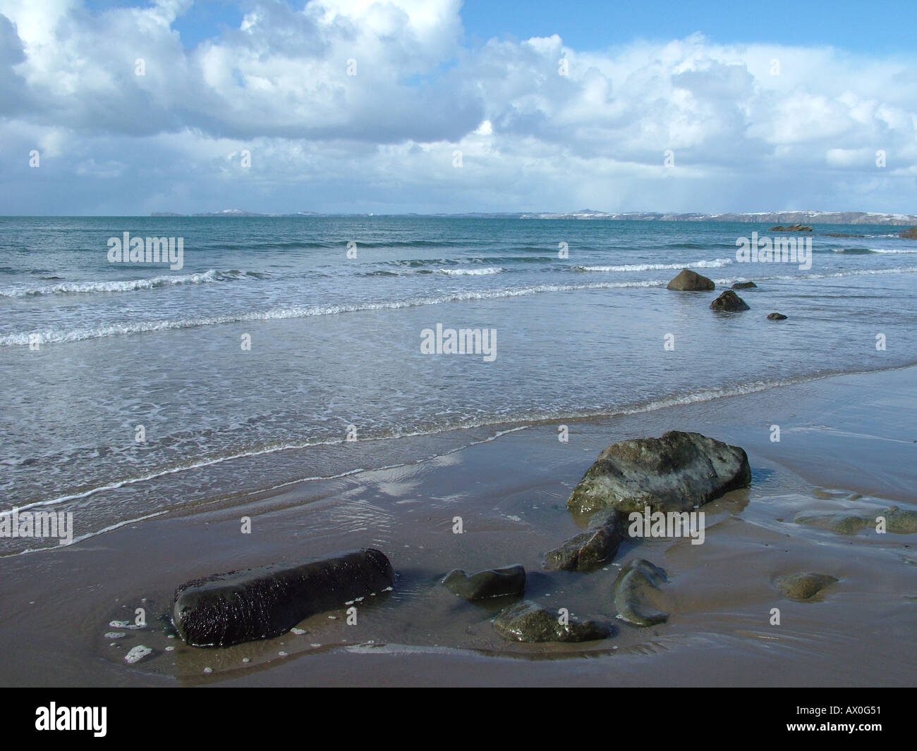 Druidston Haven beach in winter with snow Stock Photo - Alamy