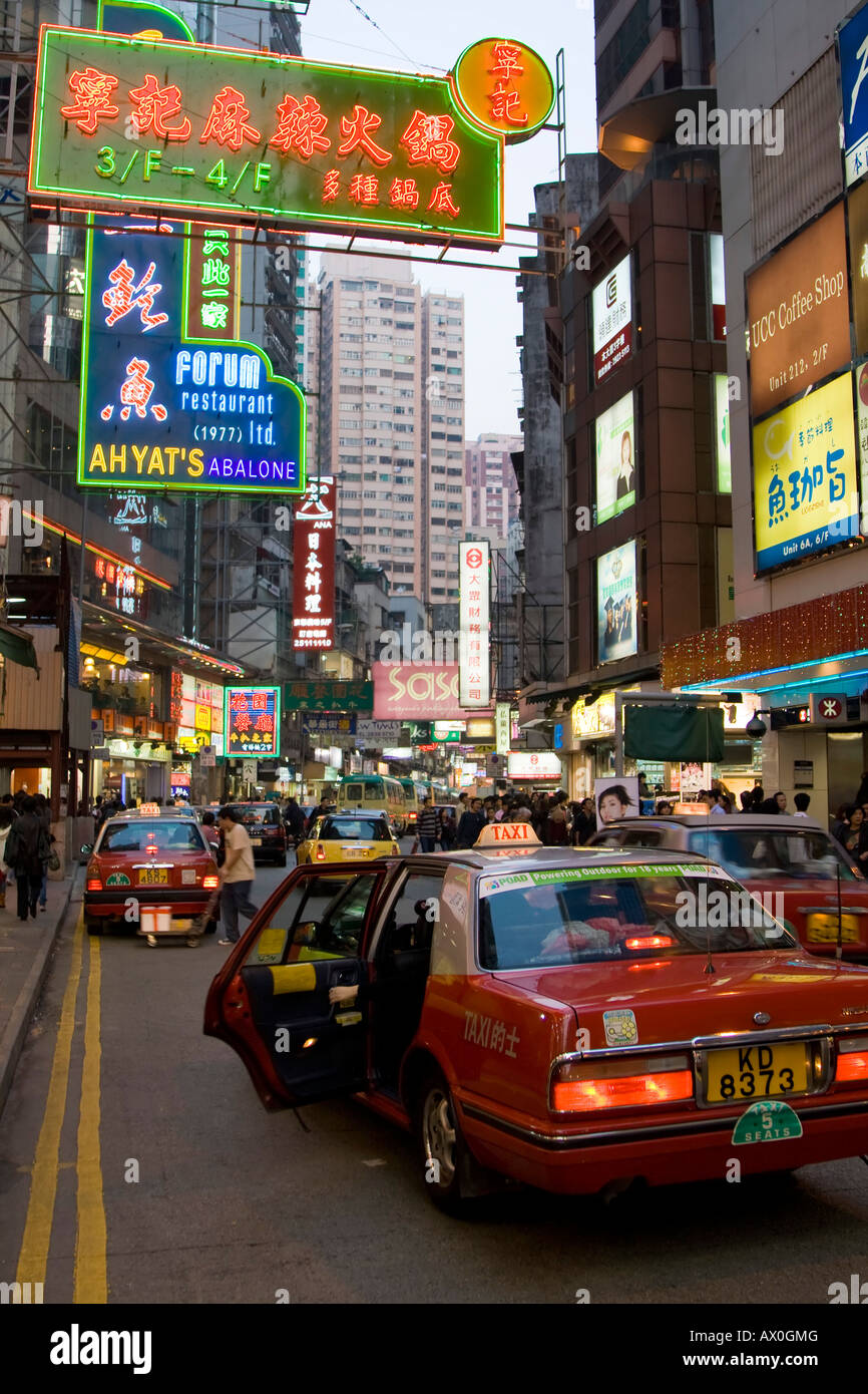 Kowloon taxi and neon signs, Hong Kong, China Stock Photo - Alamy