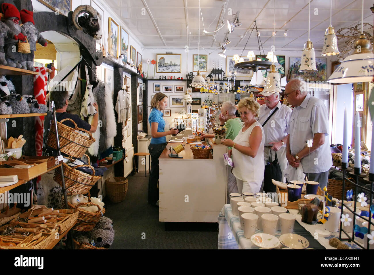 Tourists in a souvenir shop in Visby, Gotland, Sweden Stock Photo - Alamy