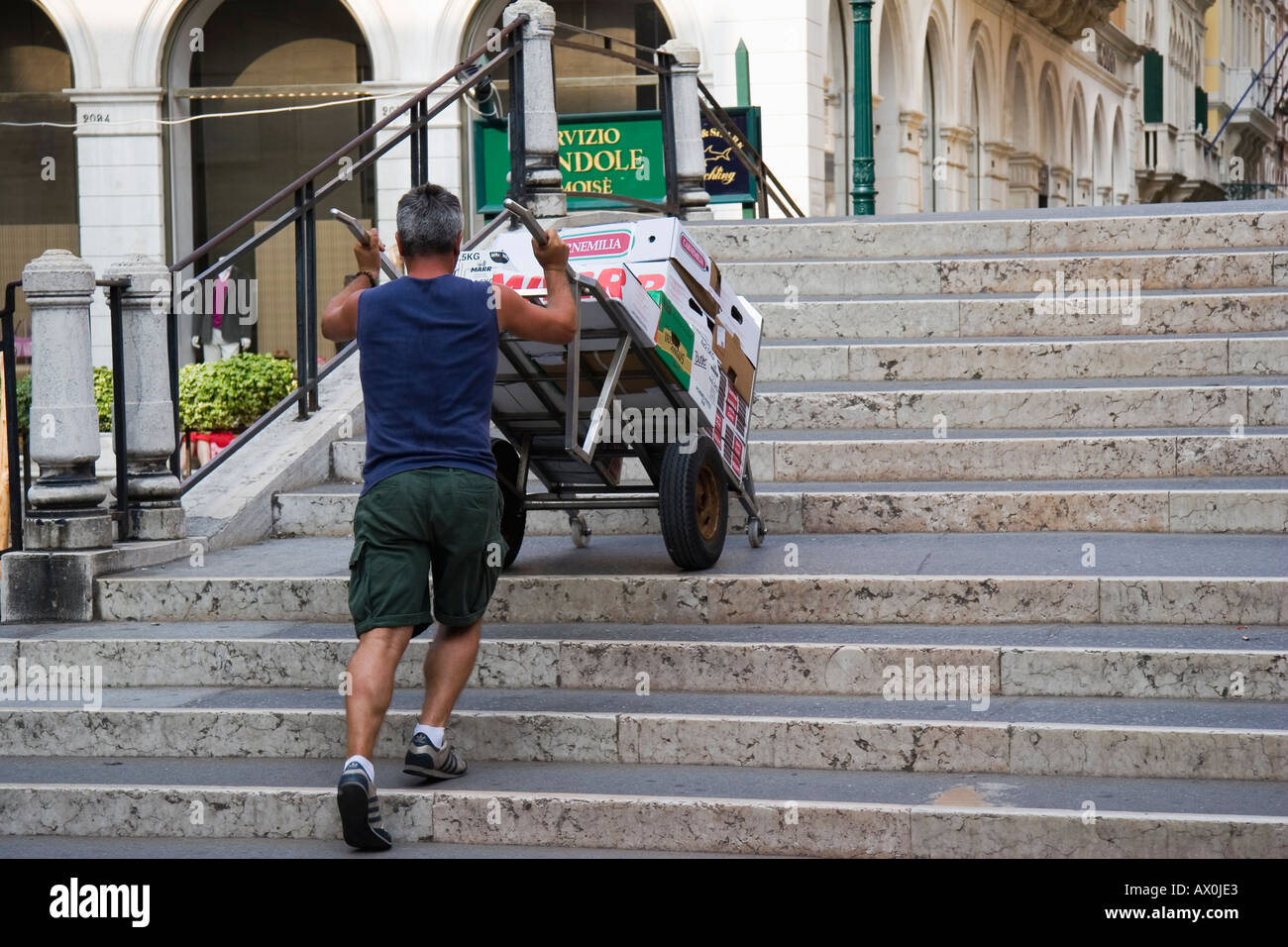 Man pushing dolly hi-res stock photography and images - Alamy