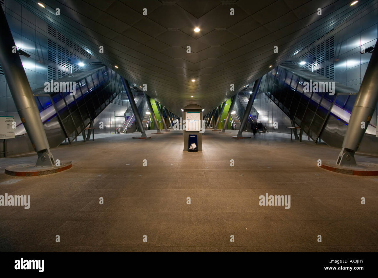 Futuristic underground station at night Stock Photo - Alamy