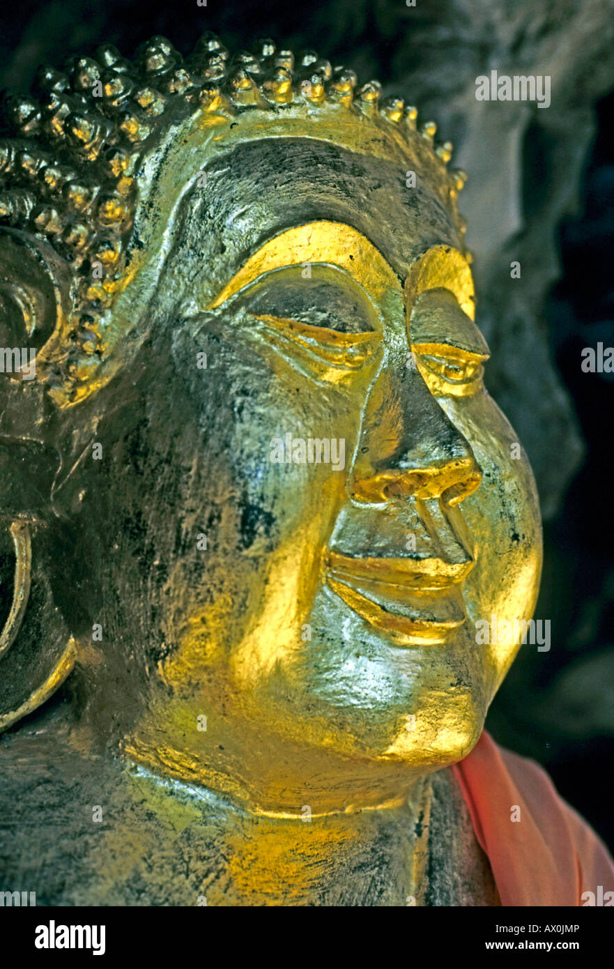 Gilded buddha head, curls ritually twisted from left to right, Luang ...