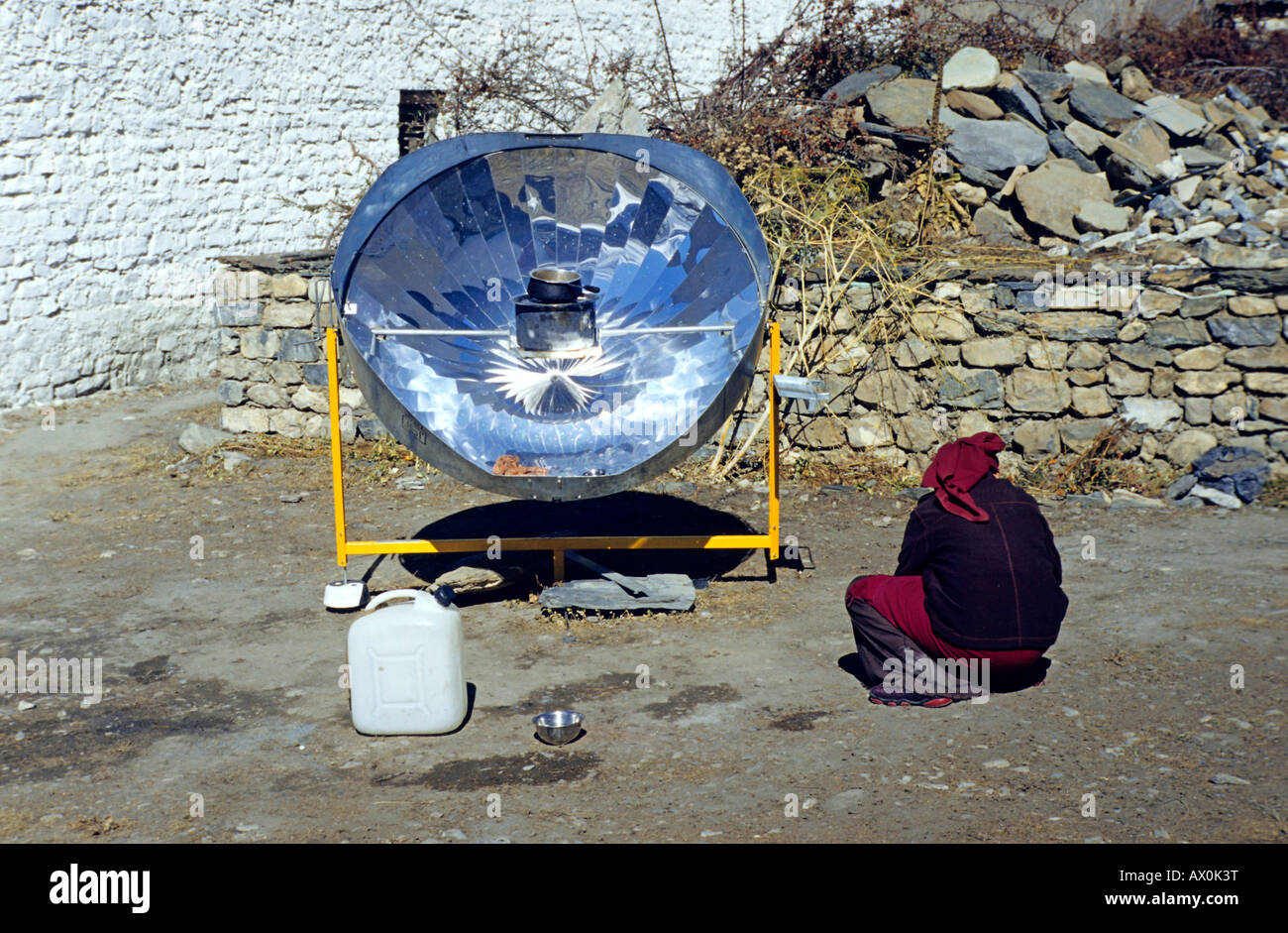Parabolic cooker, rounded mirror made of reflective iron which captures ...
