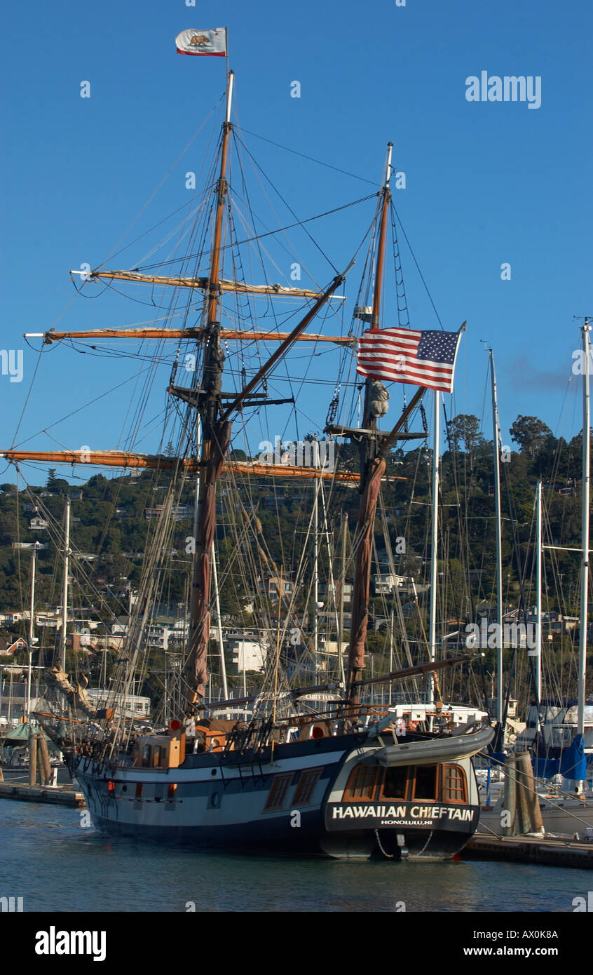 A classic top sail Ketch sits in the harbor, The Hawaiian Chieftain is ...