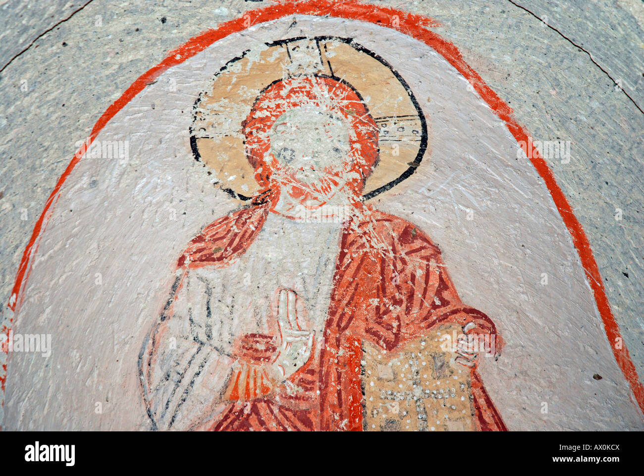 Cappadocian wall mural: depiction of Christ with book holding his right ...