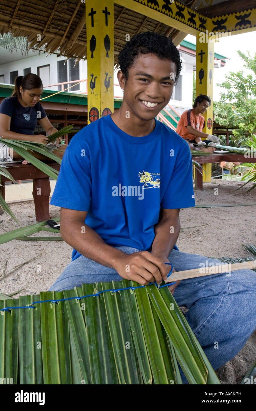Young Palauan boy weaving a roof with Pandanus leaves, Koror High ...