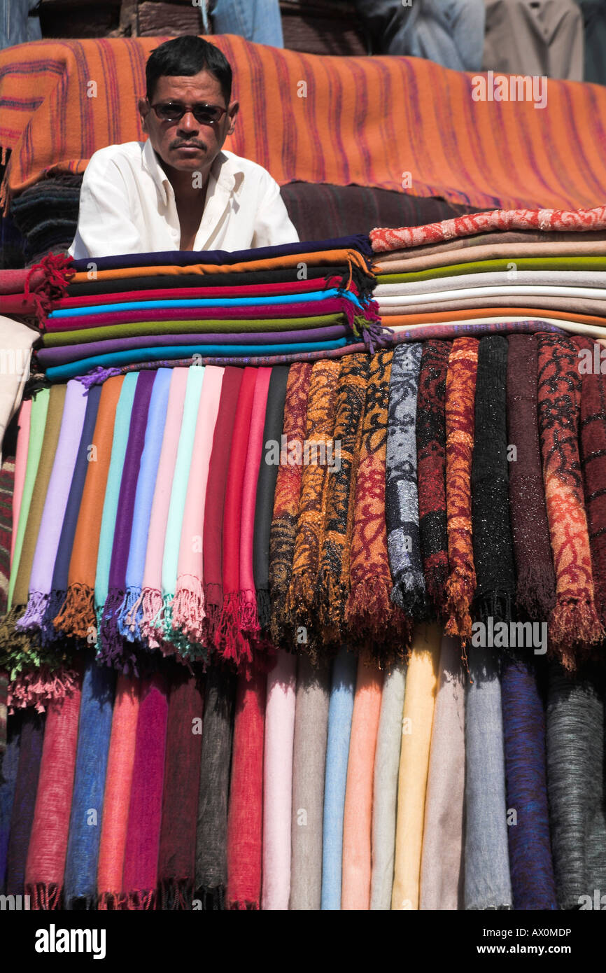 Nepal, Kathmandu, Man selling cloth on street stall Stock Photo - Alamy
