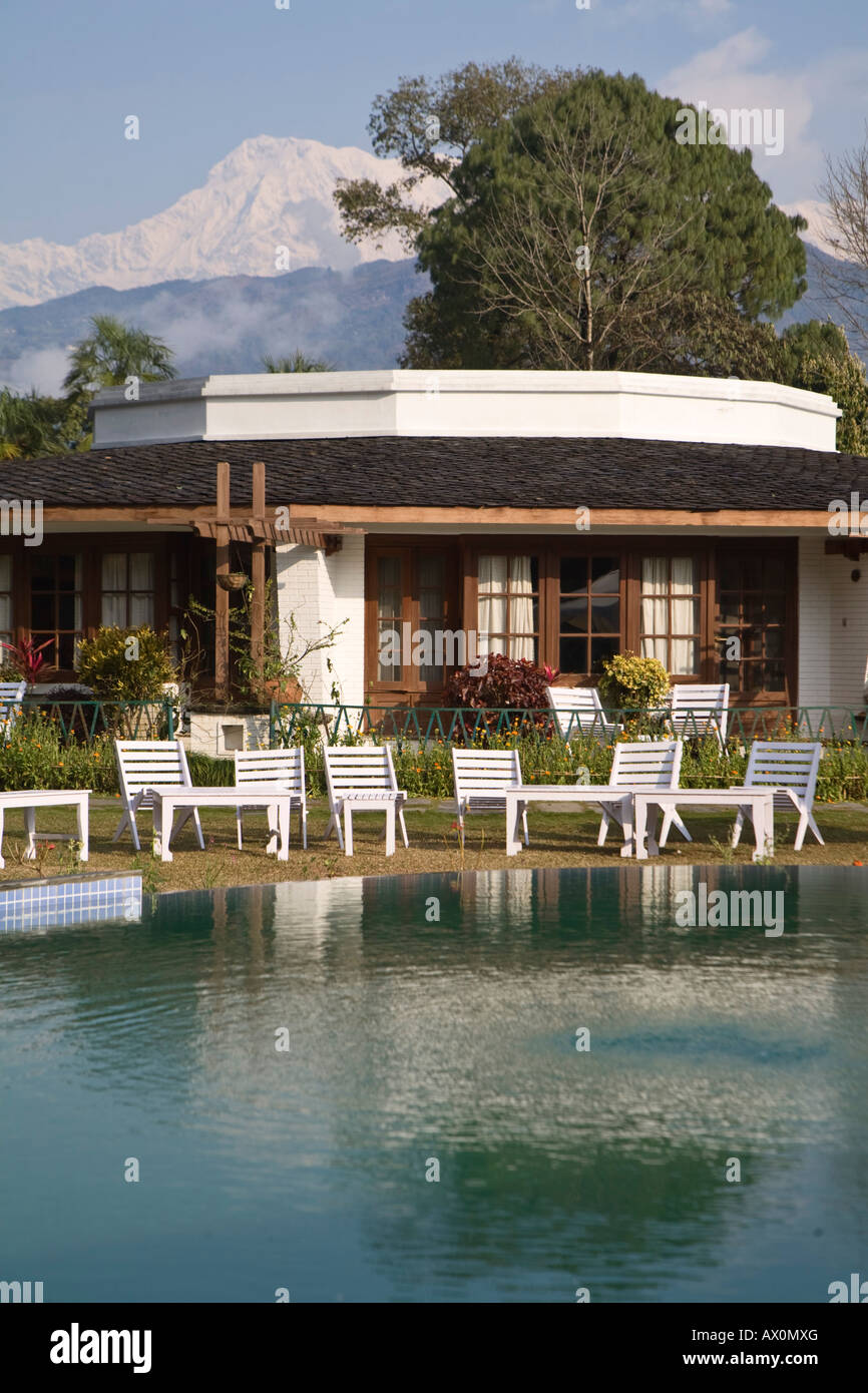 Nepal, Pokhara, Rooms and swimming pool at Fish Tail Lodge Stock Photo ...
