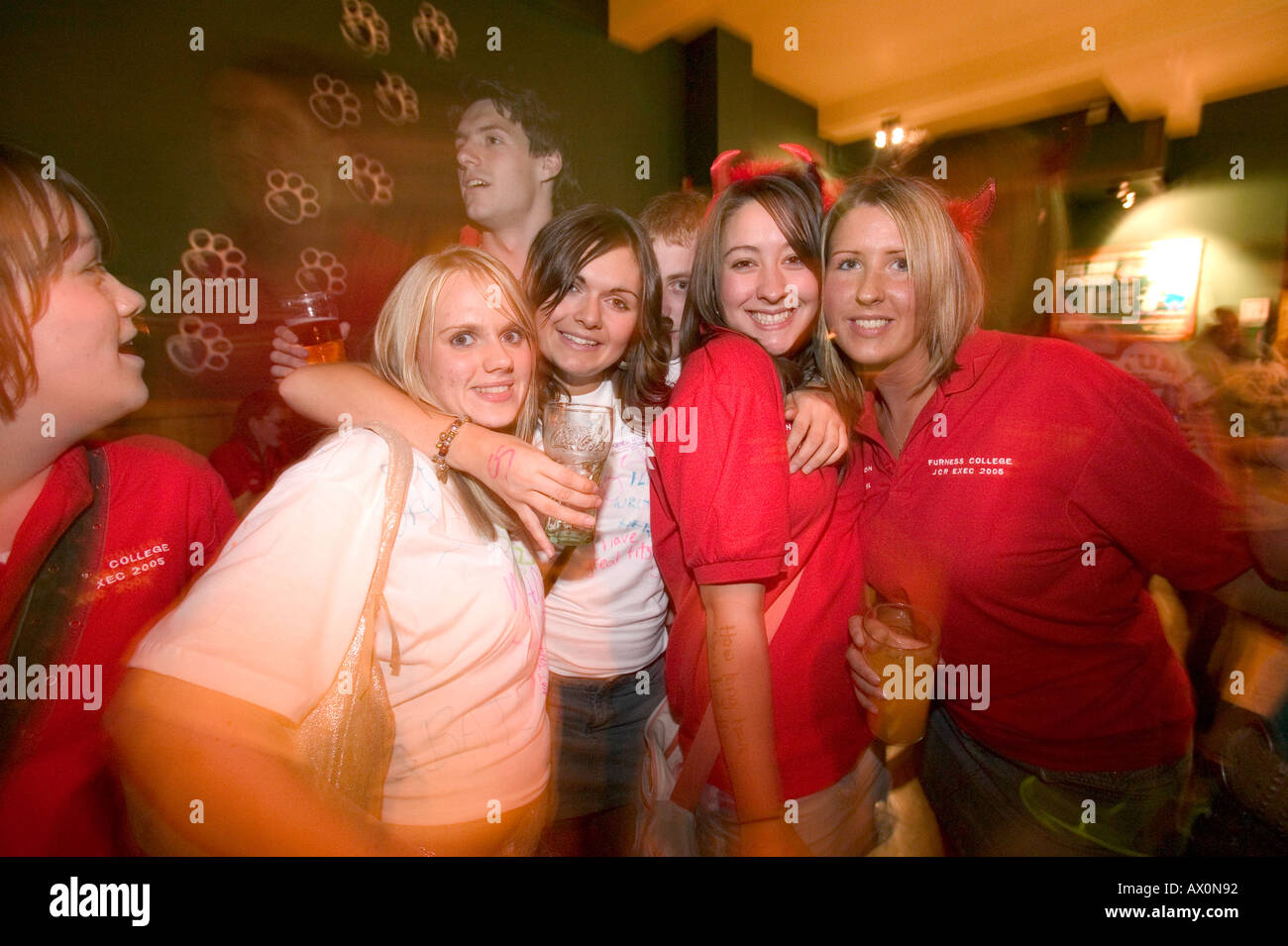 students celebrating and binge drinking in a pub in Lancaster city ...