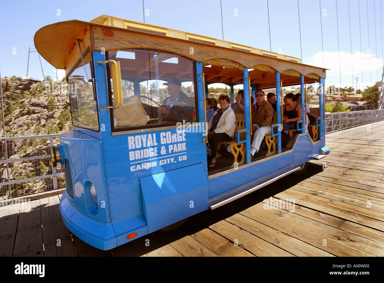 Visitors ride a tram over bridge 1 000 feet above Arkansas River in ...