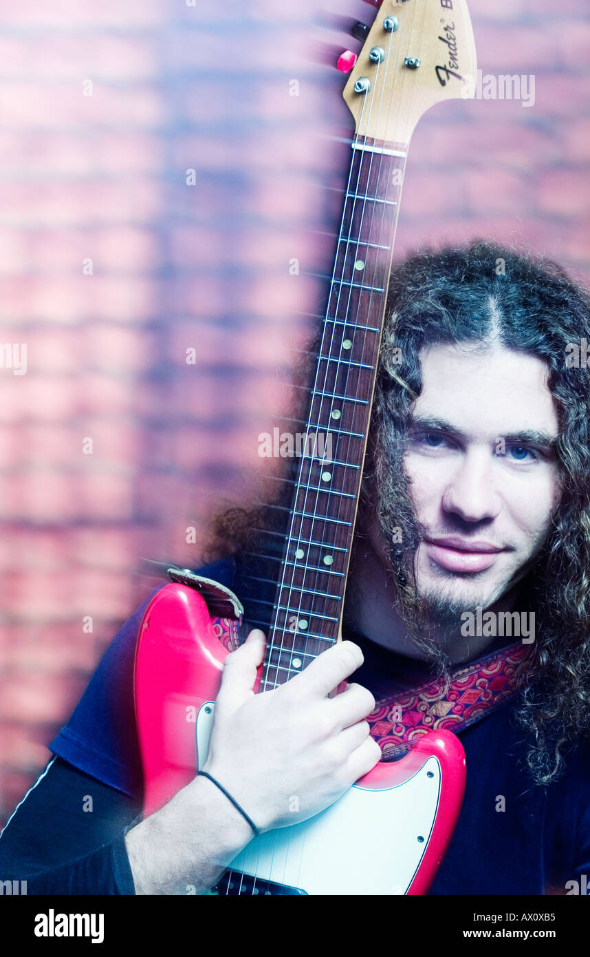 Portrait male guitar player Stock Photo - Alamy