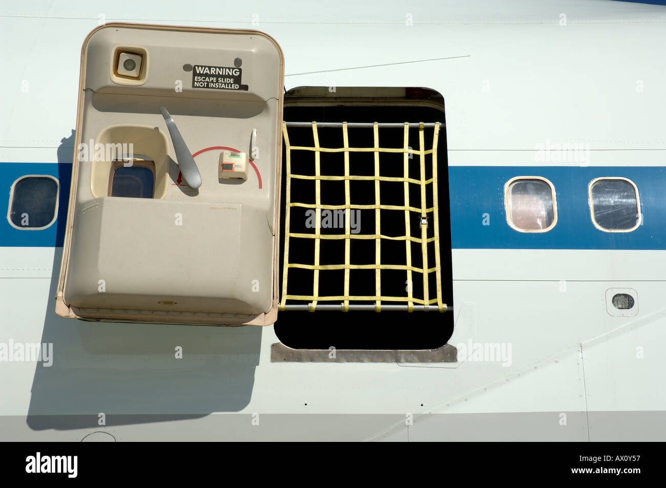 Airliner exit door Stock Photo - Alamy
