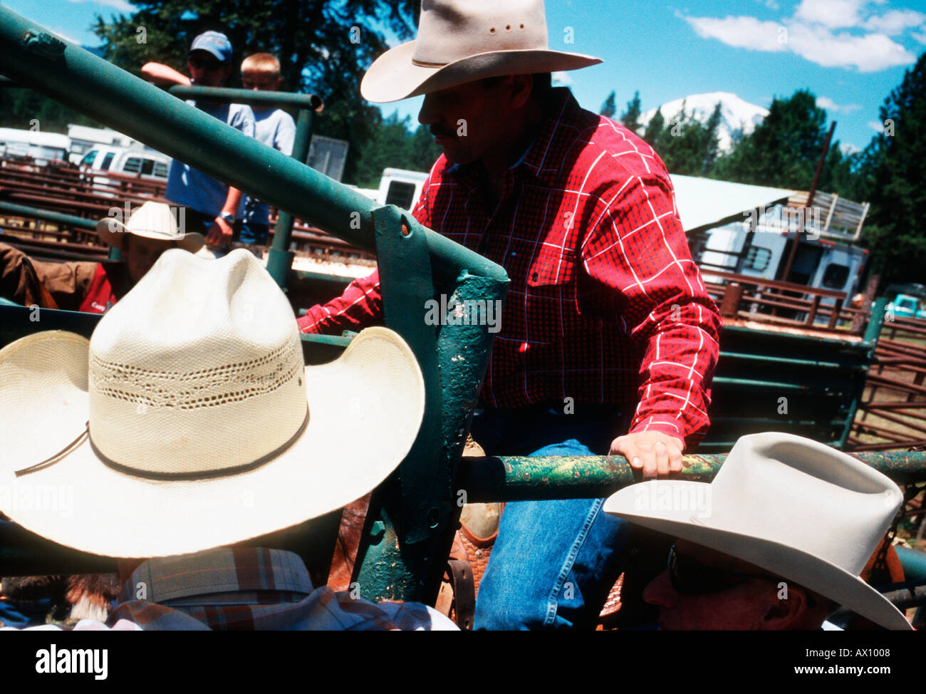 Three men in cowboy hats at a rodeo Stock Photo - Alamy