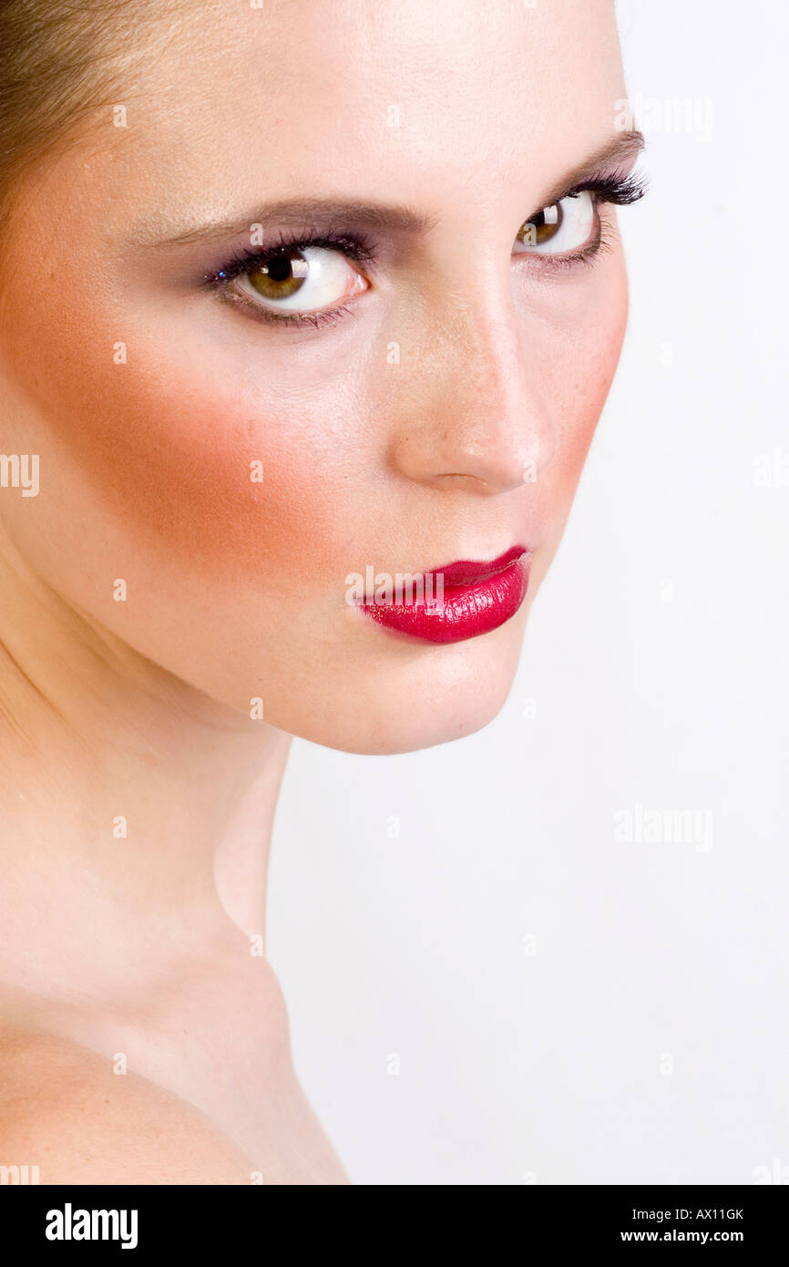 Studio photo of a young woman, detailed photo of made-up face with ...