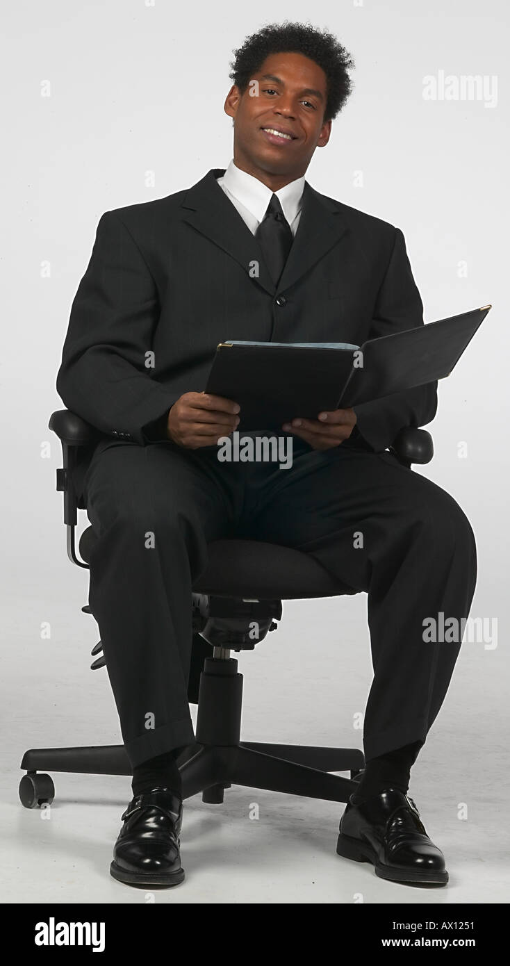 Man seated on chair hi-res stock photography and images - Alamy