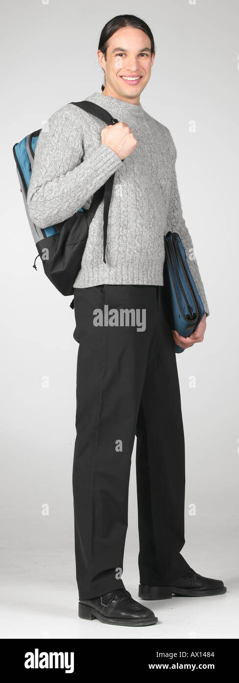 Student carrying books in backpack hi-res stock photography and images ...