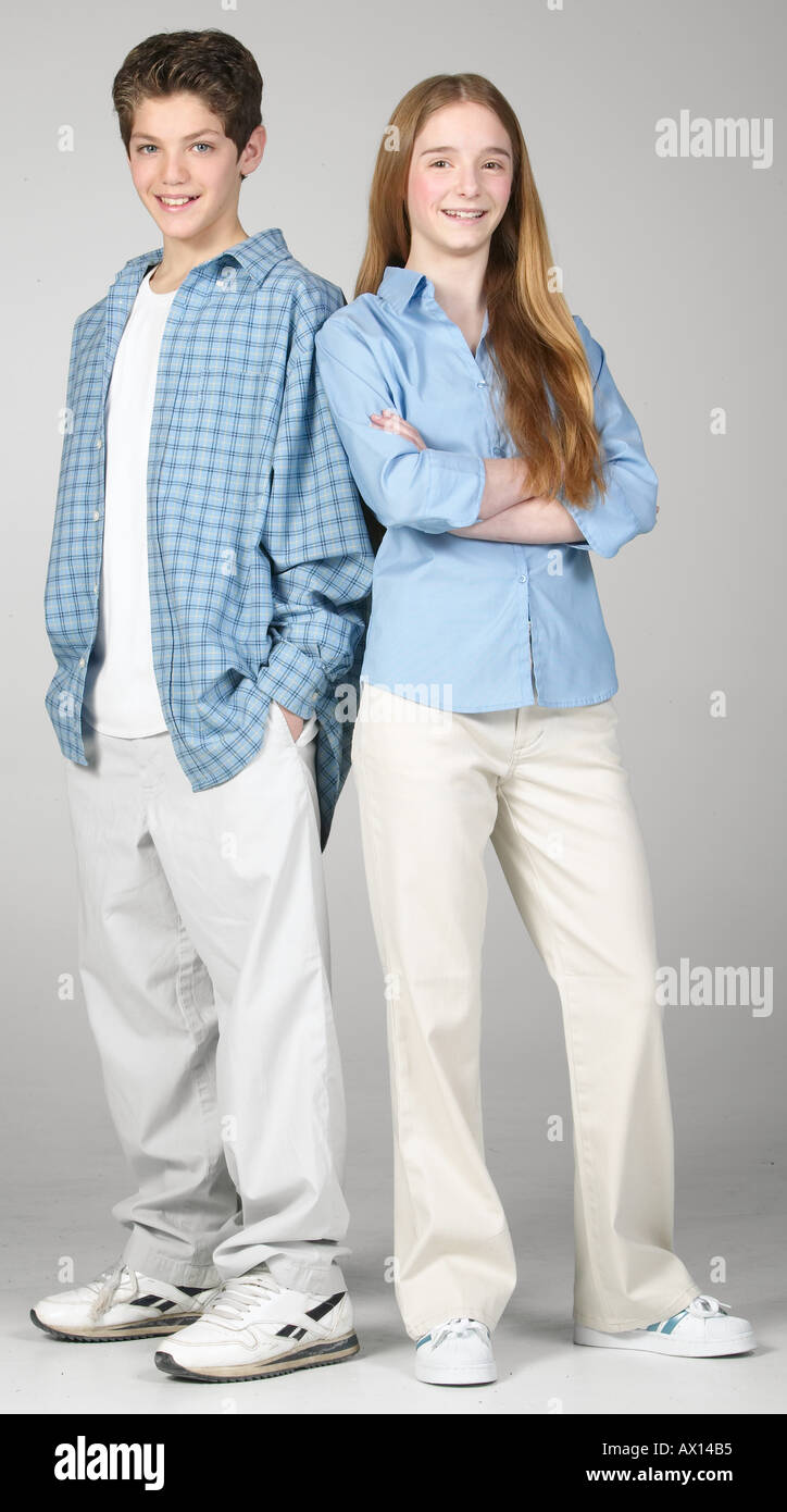 Two People Standing Next To Each Other