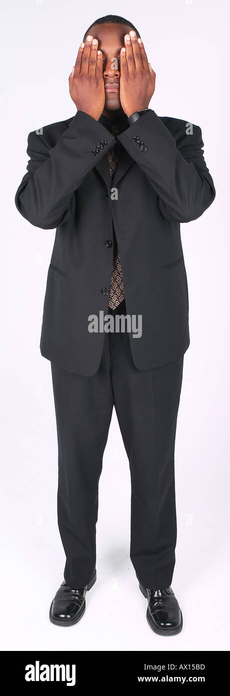 Ashamed business man hiding face hi-res stock photography and images ...