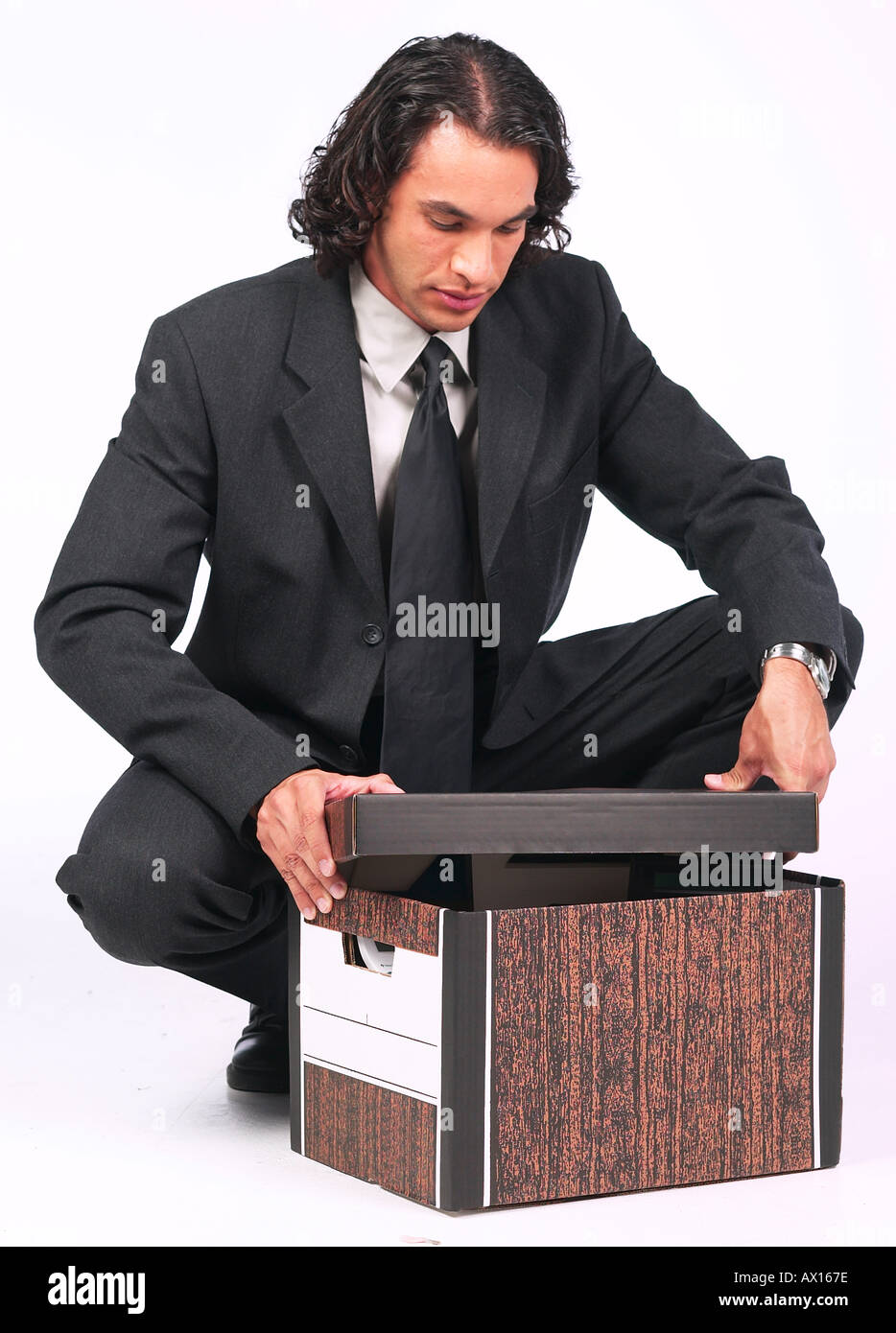 Man packing suit Cut Out Stock Images & Pictures - Alamy