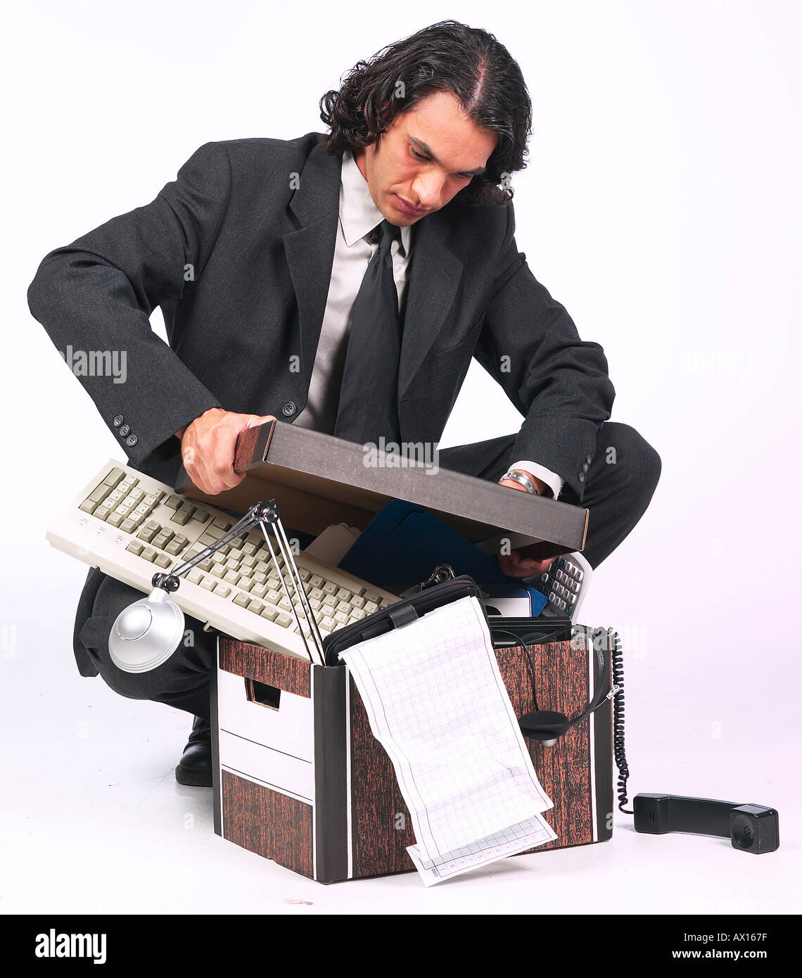 Man packing suit Cut Out Stock Images & Pictures - Alamy