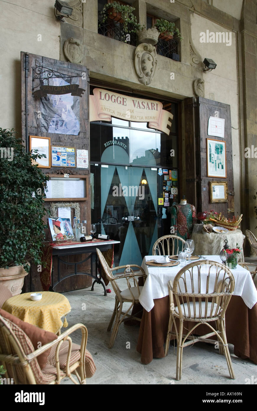 Restaurant with wooden shutters under the Vasari Loggia in Piazza ...