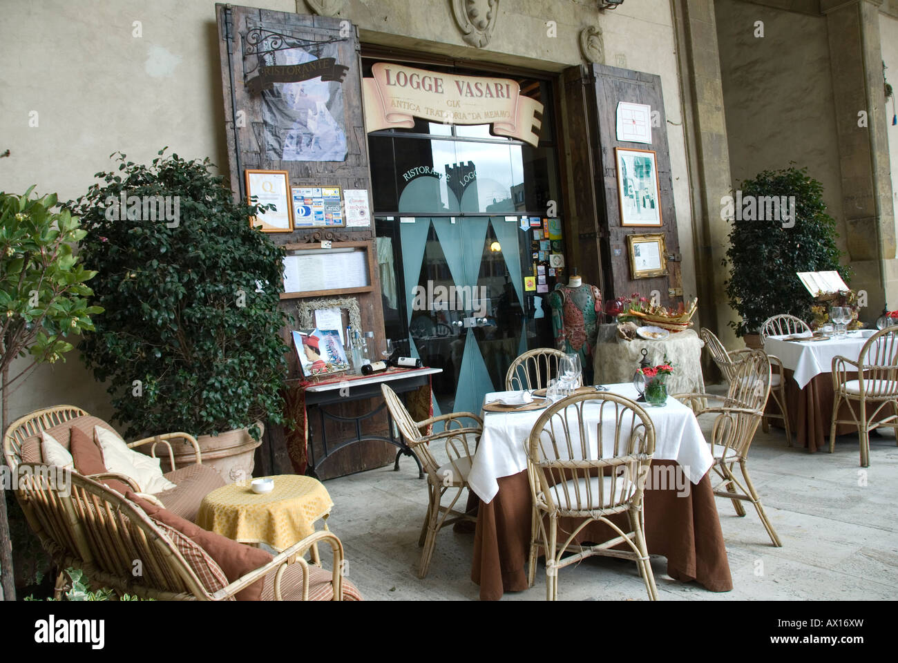Restaurant with wooden shutters under the Vasari Loggia in Piazza ...