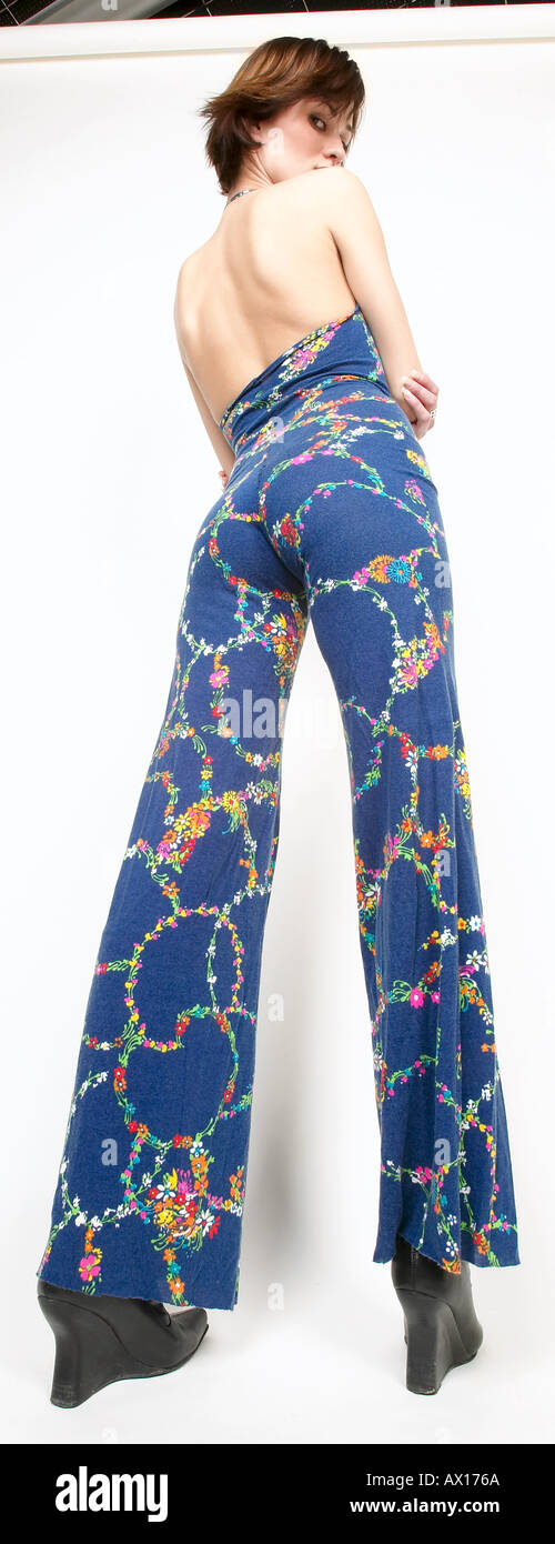 Back of woman in blue outfit Stock Photo - Alamy