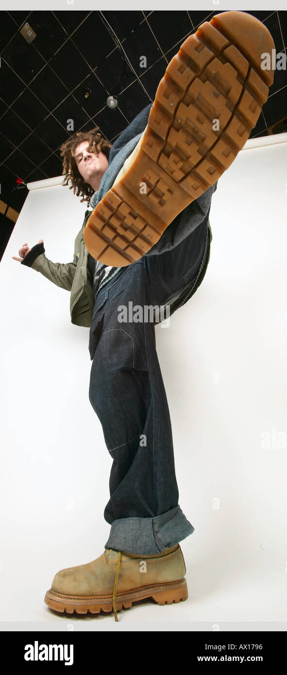 View of man s kicking boot from below Stock Photo - Alamy