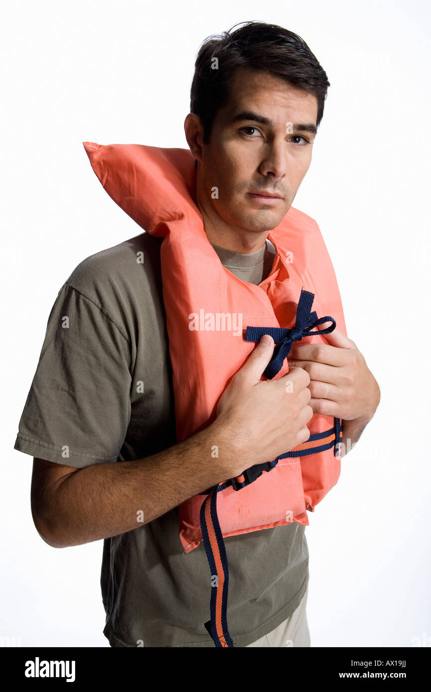 A man wearing a life jacket Stock Photo - Alamy