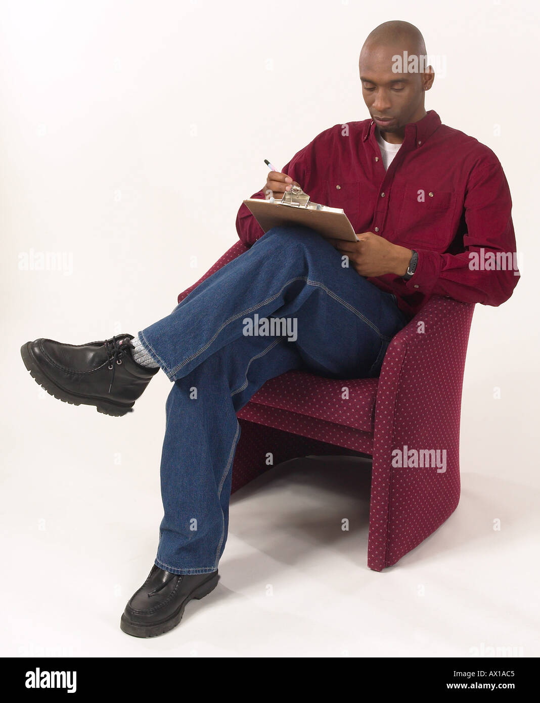 Seated man hi-res stock photography and images - Alamy