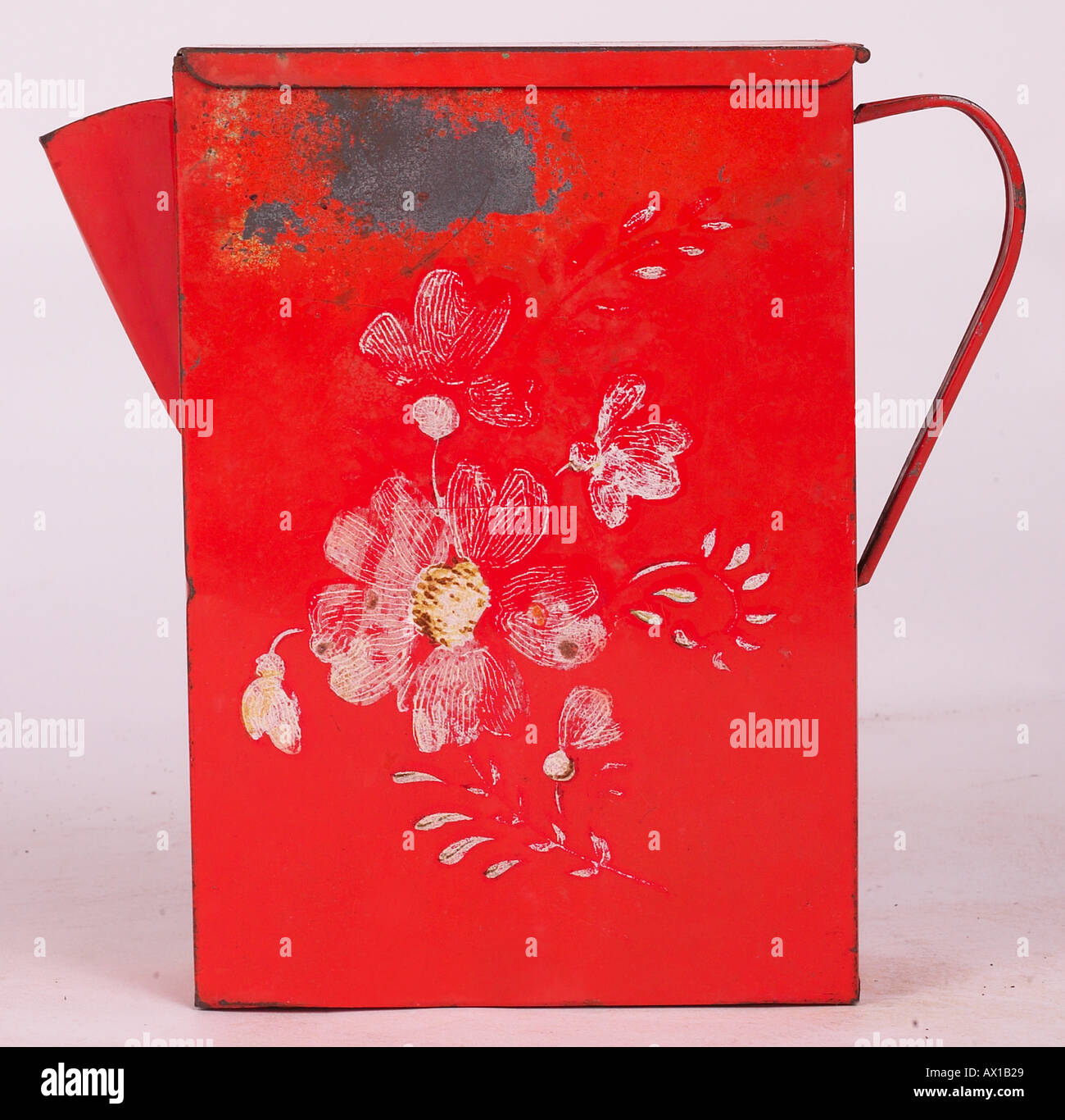 antique metal painted red pitcher 11 Stock Photo - Alamy