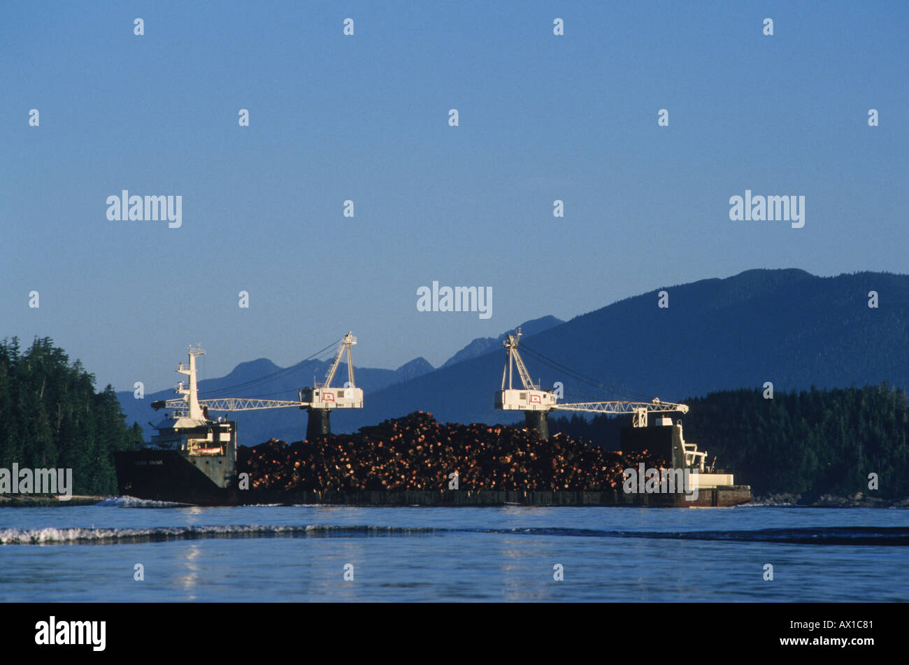Canada British Columbia loaded log barge in Georgia Strait Stock Photo ...
