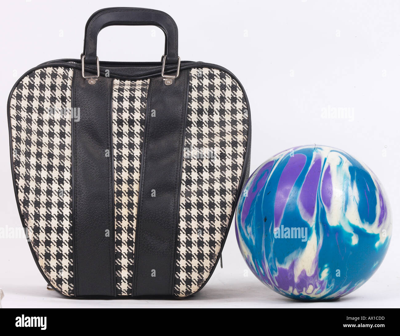 Blue bowling ball and checkered bag L3 Stock Photo - Alamy