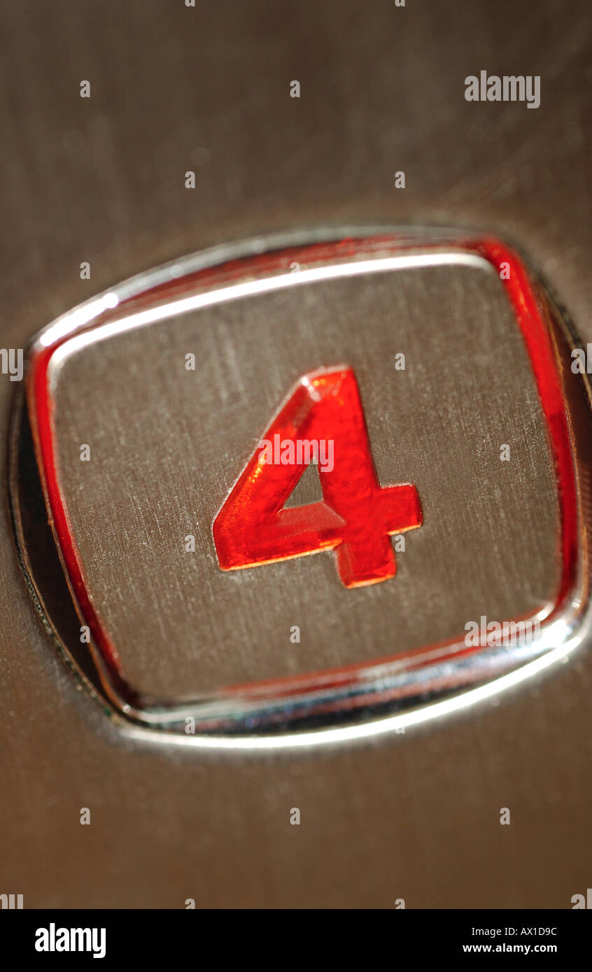 Number four on elevator button Stock Photo - Alamy