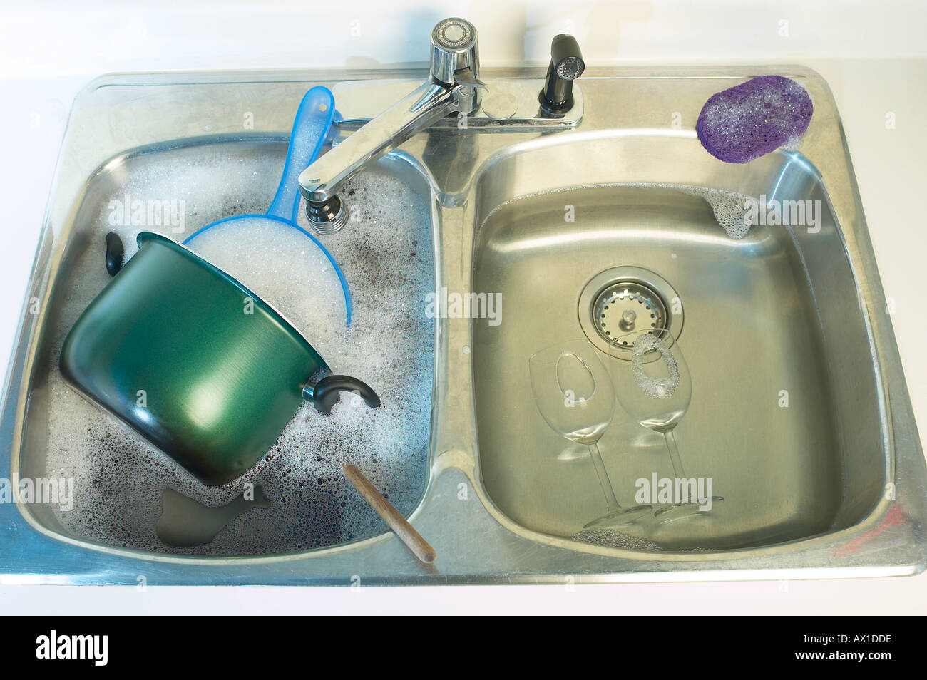 Dirty dishes in kitchen sink Stock Photo - Alamy