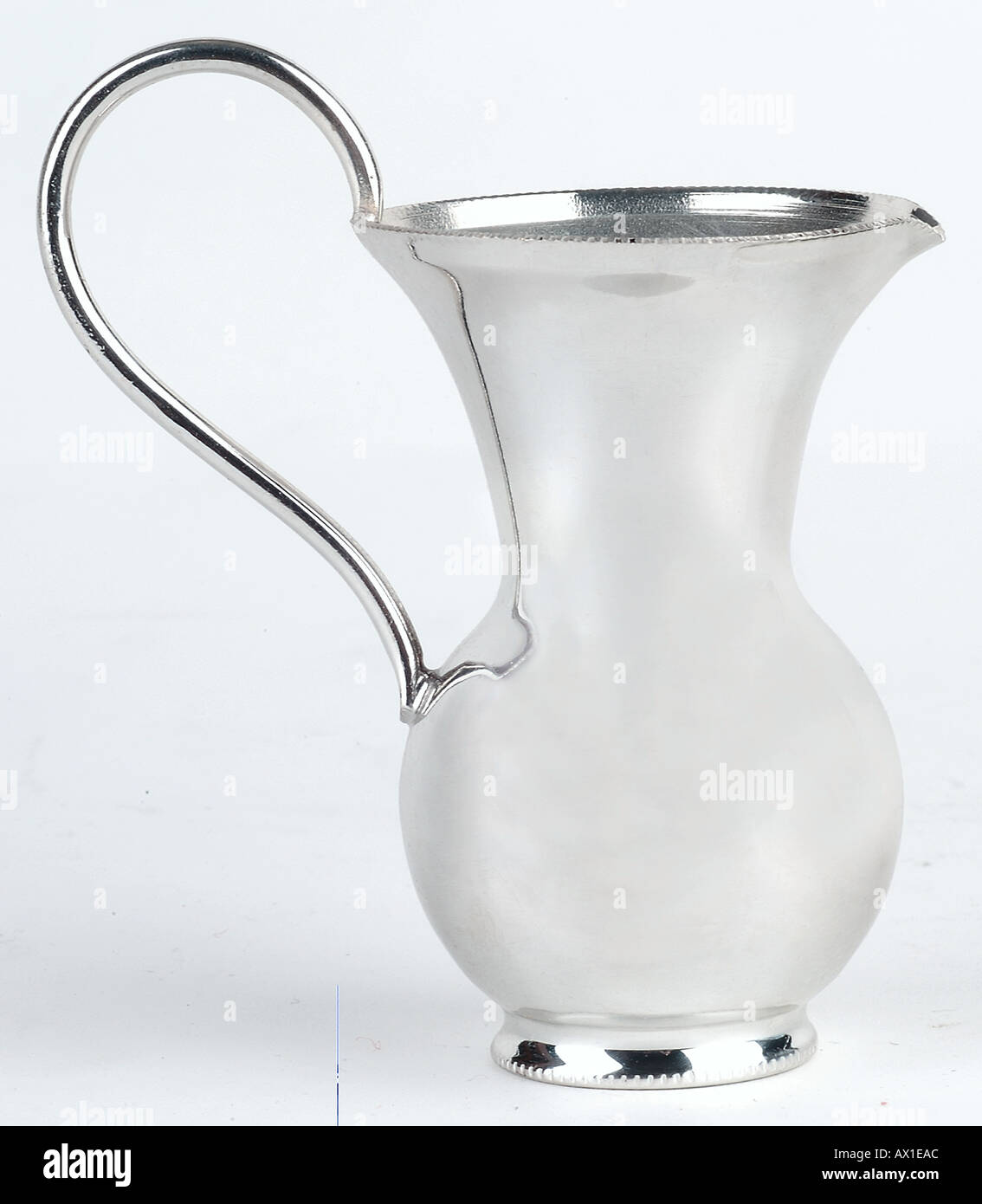 Silver jug hi-res stock photography and images - Alamy