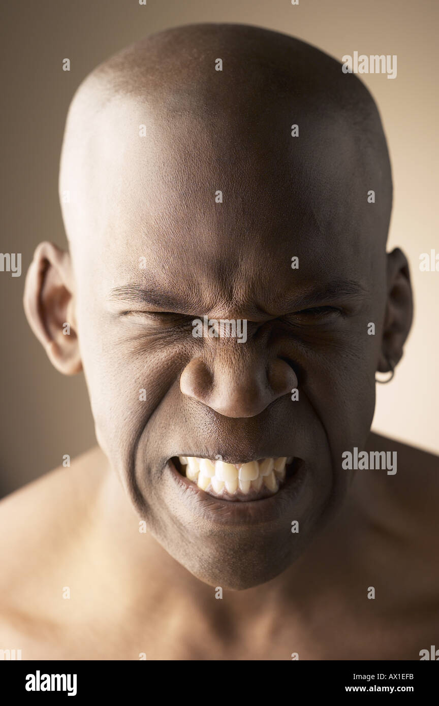 Clenching clenched teeth hi-res stock photography and images - Alamy