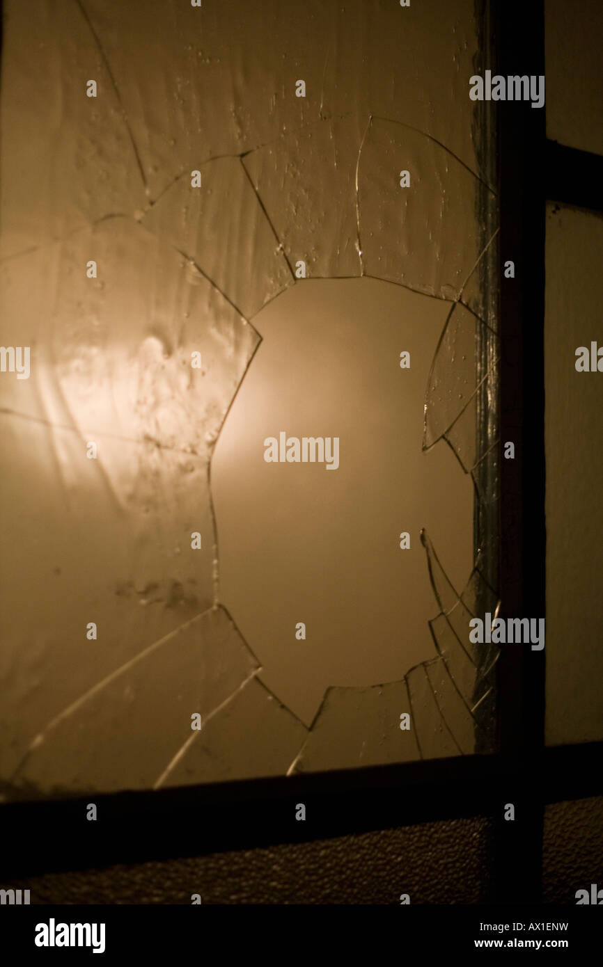 A broken window Stock Photo - Alamy