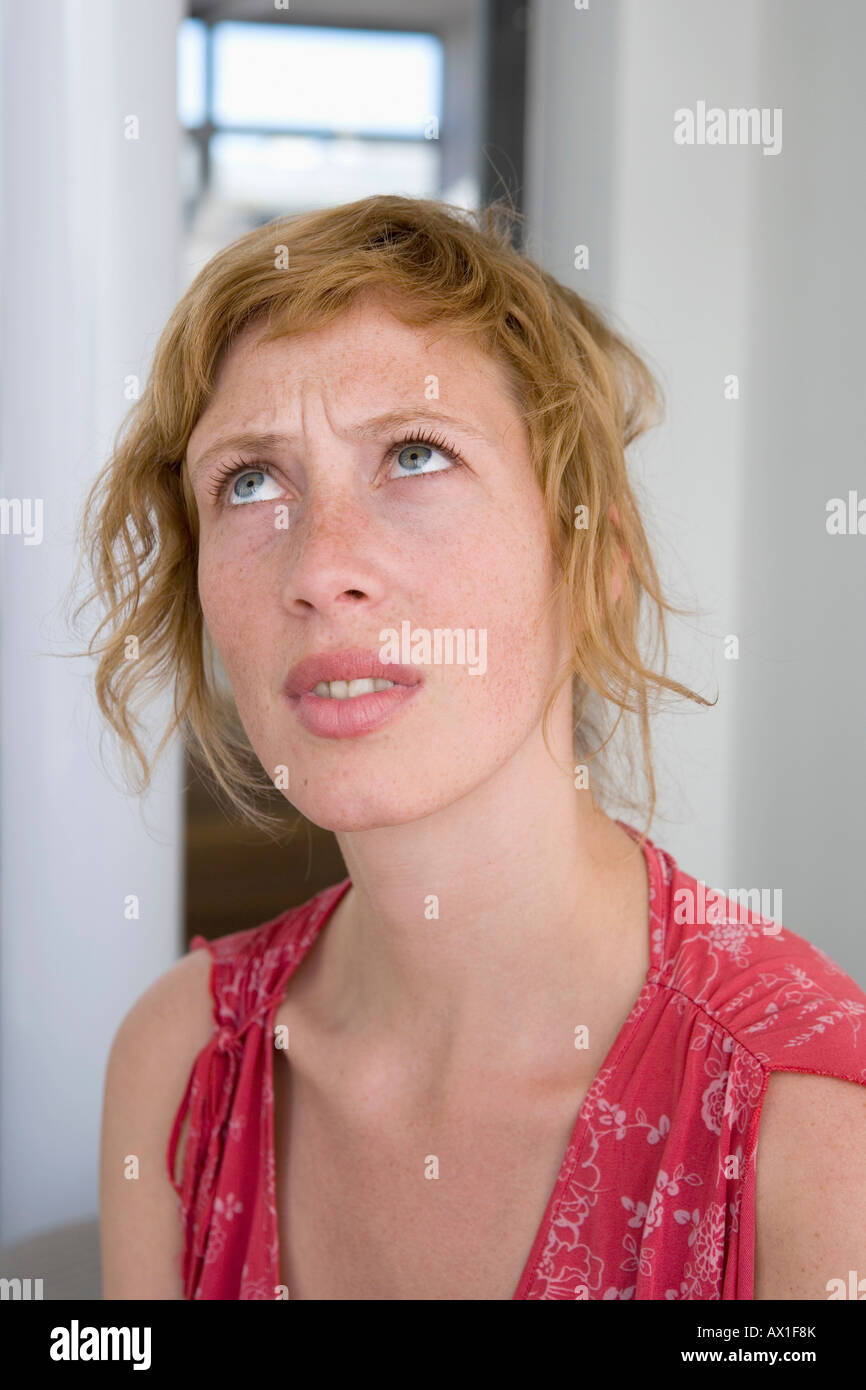 Portrait of a woman looking up Stock Photo - Alamy
