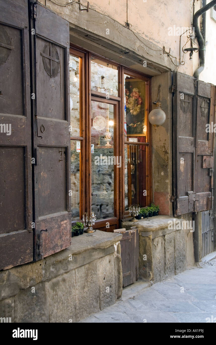 Ancient shop selling antiques and jewellery, in the old style with fold ...