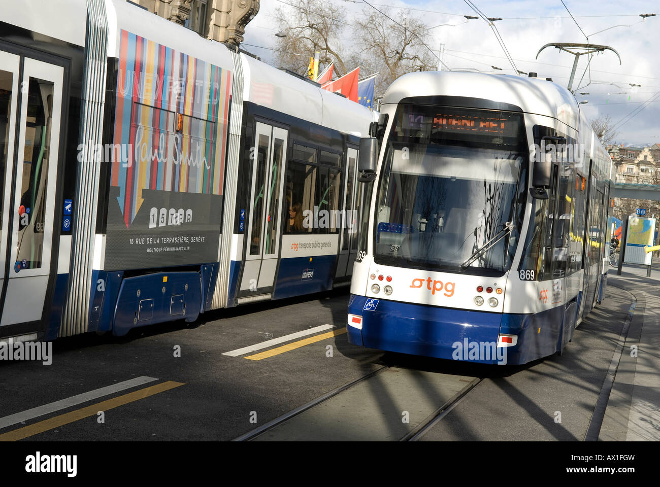 Trams on busy street hi-res stock photography and images - Alamy